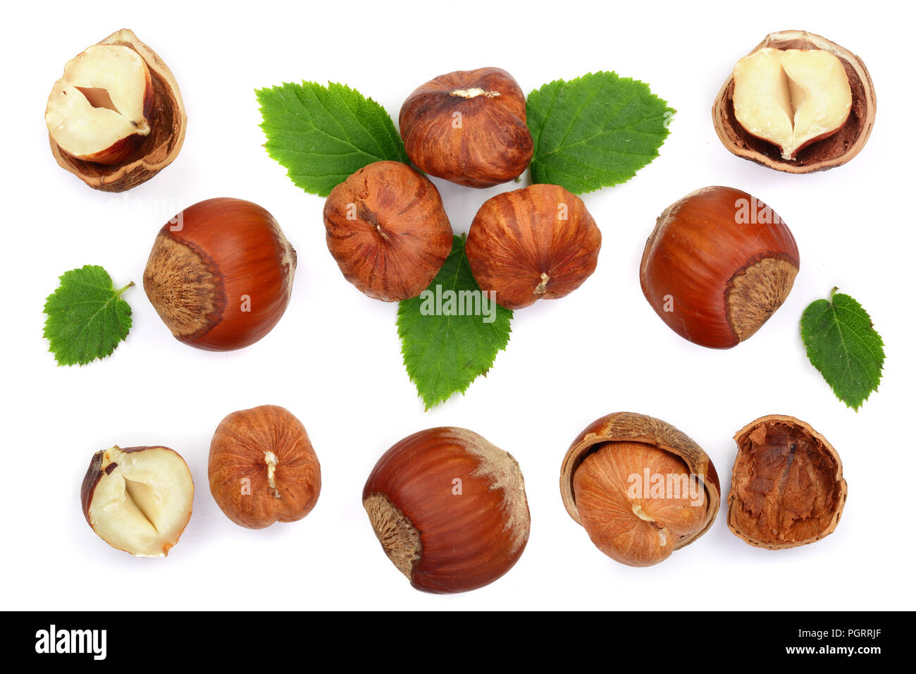 Hazelnuts with leaves isolated on white background. Top view. Flat lay ...