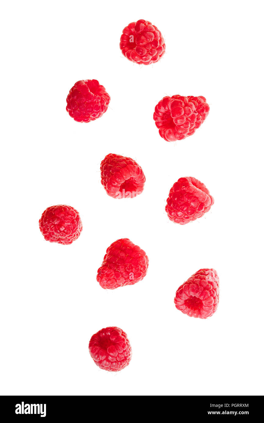 falling red raspberries isolated on white background Stock Photo - Alamy