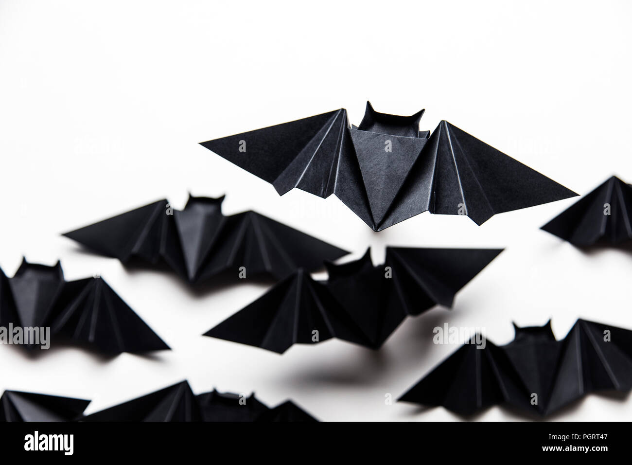 Halloween origami paper dracula bats on a white background Stock Photo ...