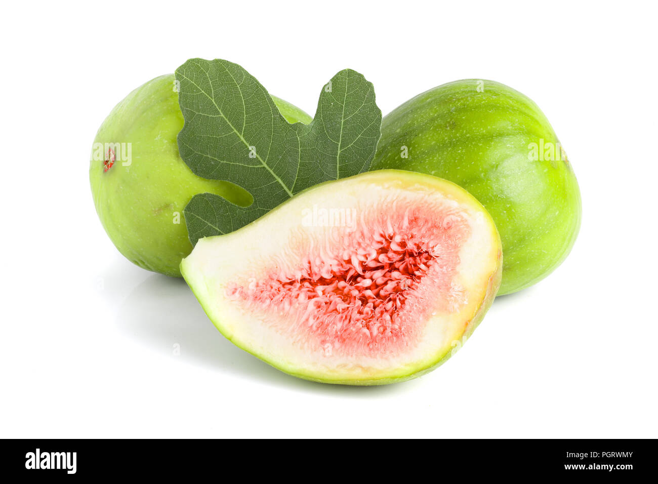 Ripe green fig fruit and half with leaf isolated on white background ...