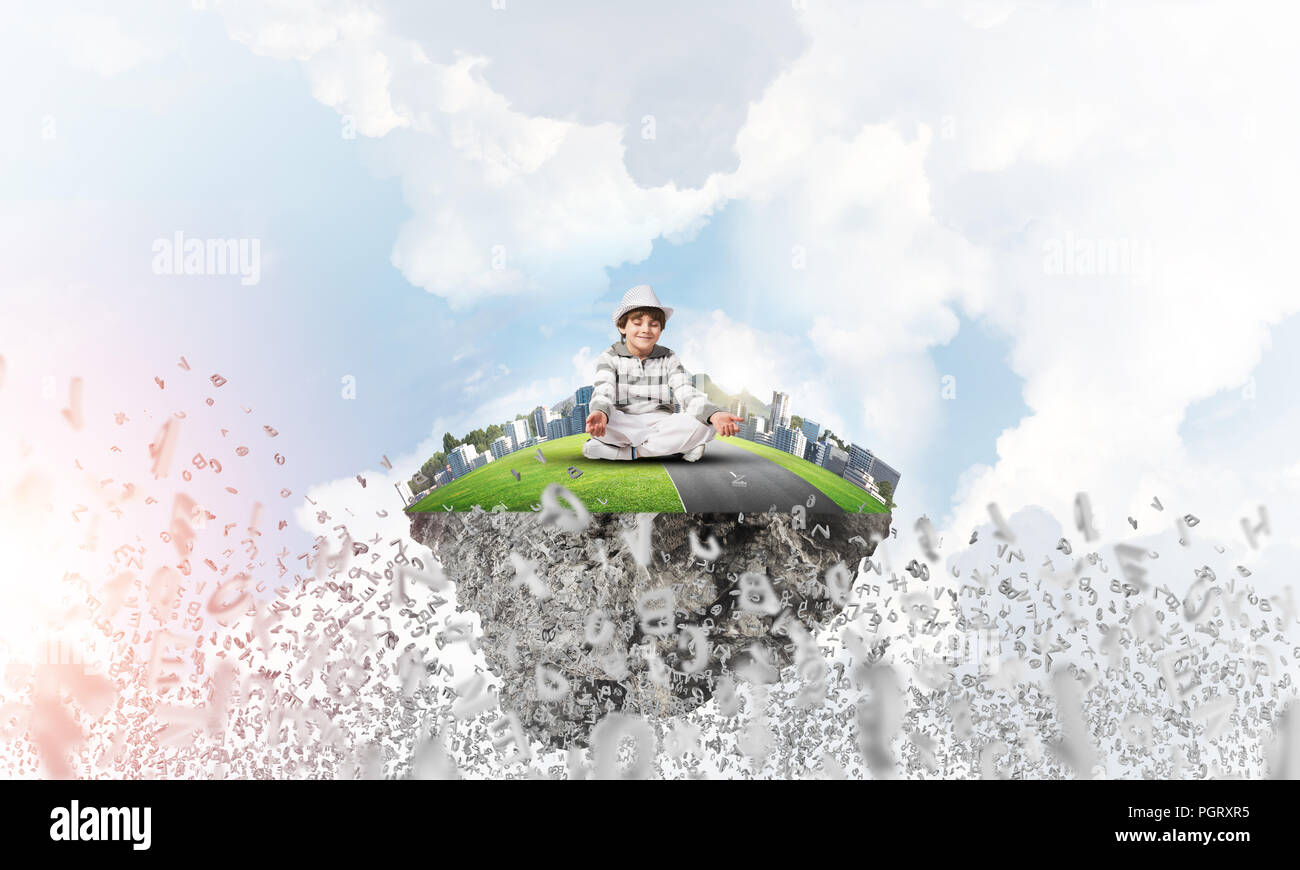 Little boy keeping mind conscious Stock Photo - Alamy