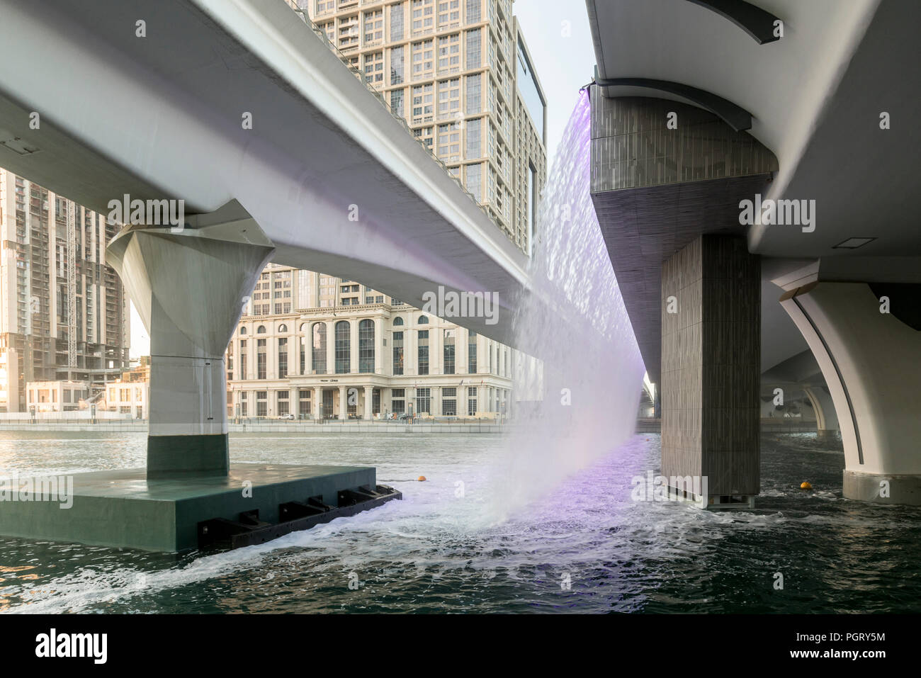 The Dubai Water Canal waterfall, where the canal meets Sheikh Zayed ...