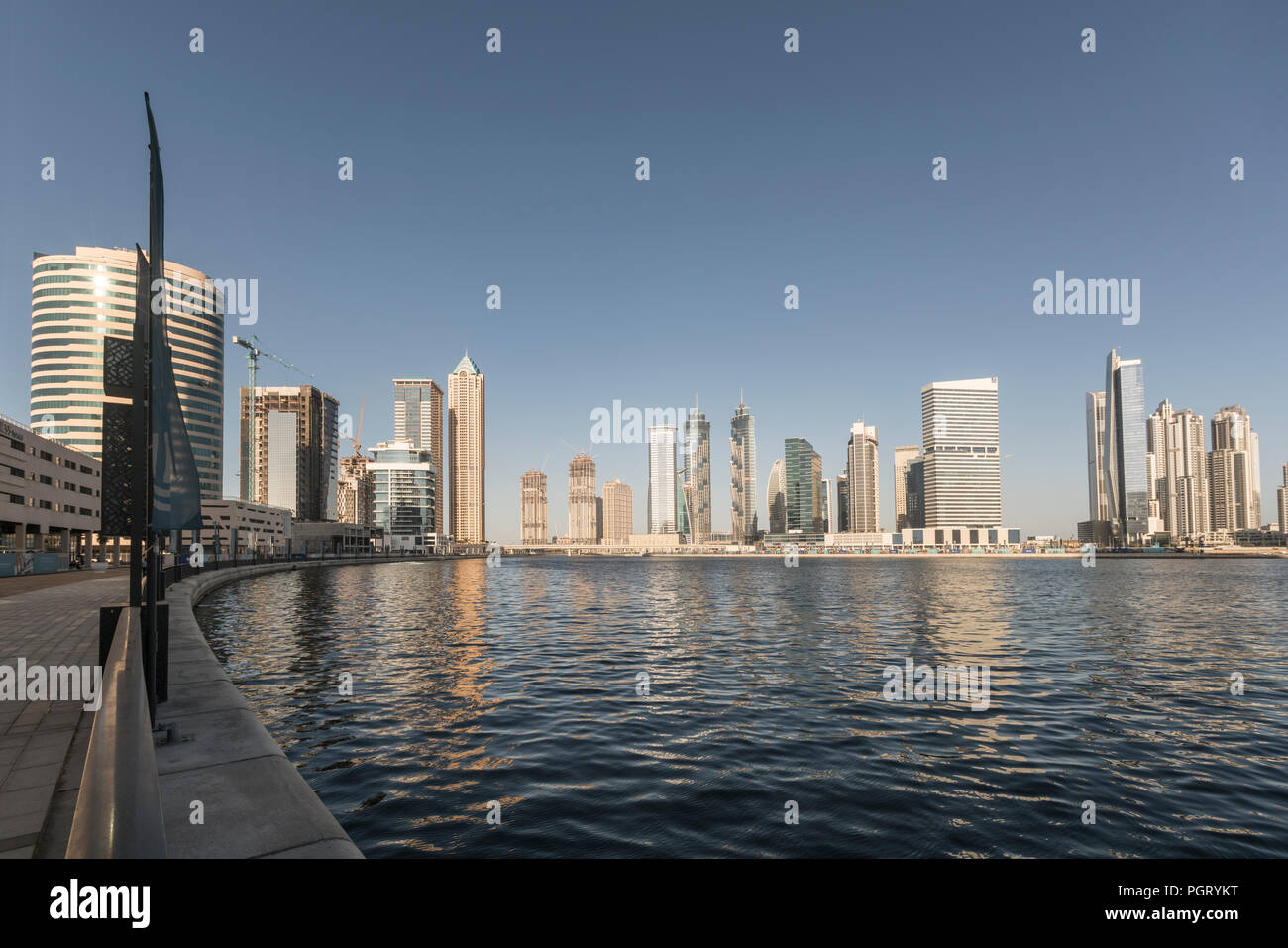 View over Dubai Water Canal towards the skyscrapers of Business Bay ...