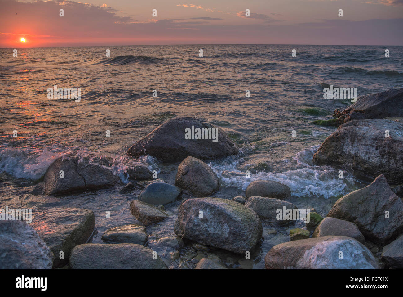 sunset over the sea. Estonia. Europe Stock Photo - Alamy