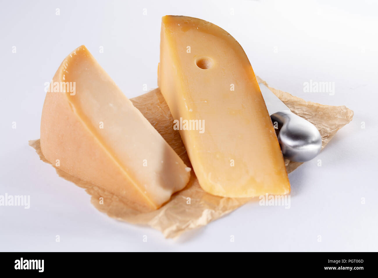 Dutch old cheeses, made from cow and goat milk on white table Stock ...