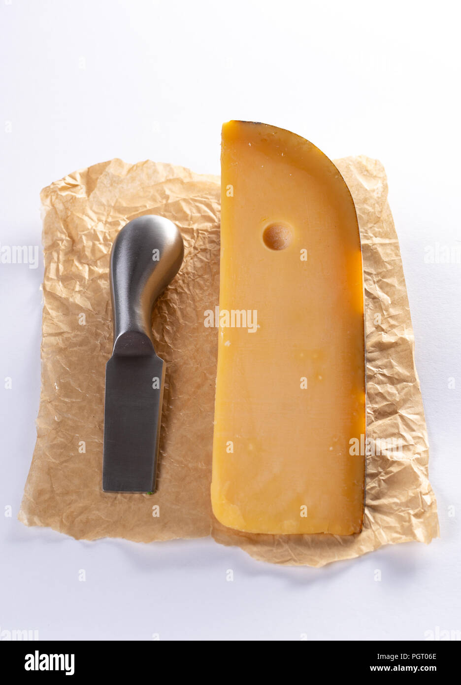 Dutch old Amsterdam cheese, made from cow milk on white background ...