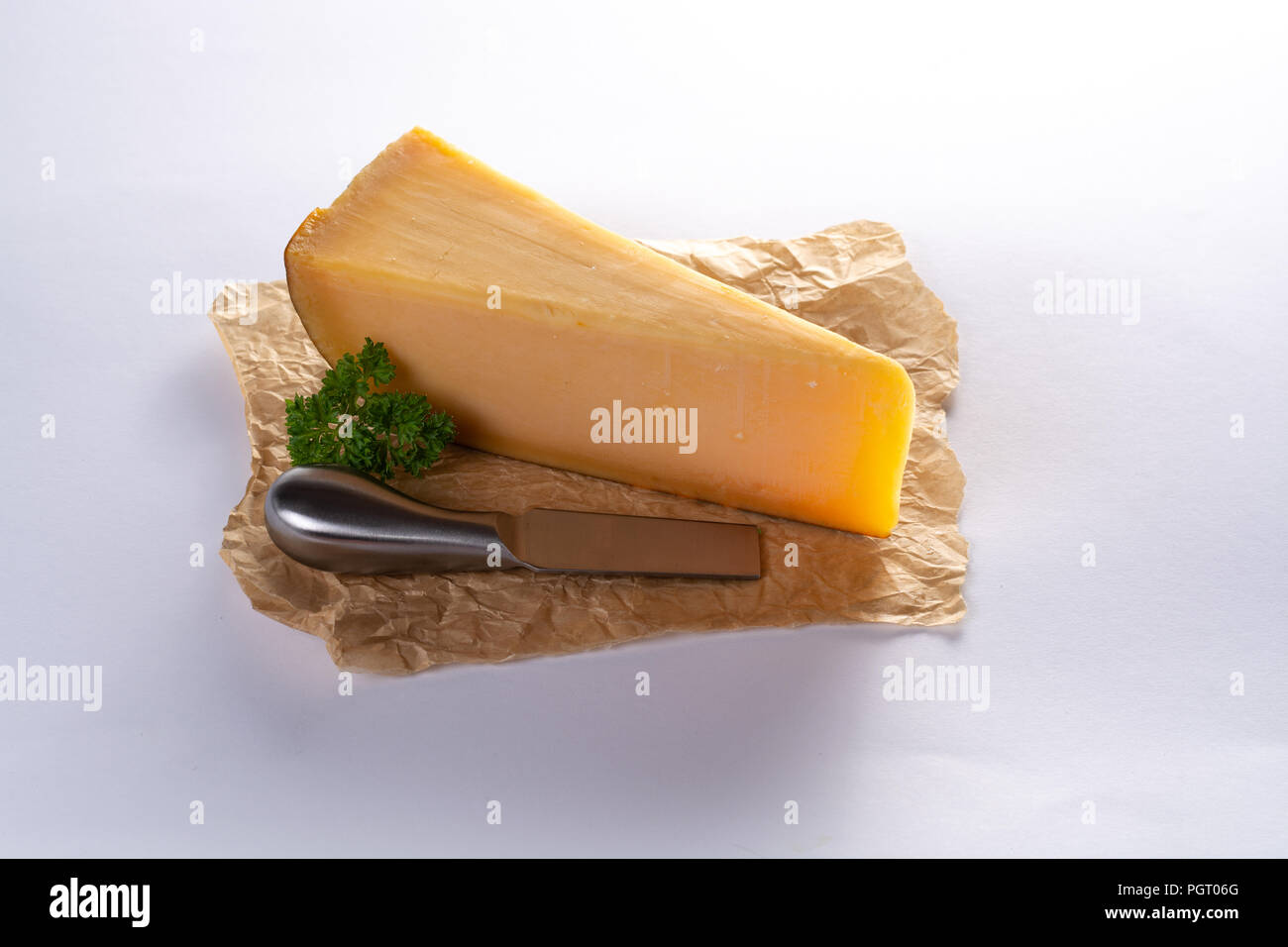 Dutch old Amsterdam cheese, made from cow milk on white background ...