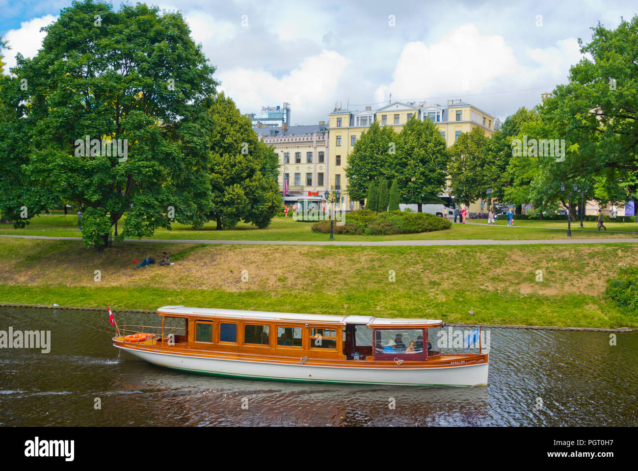 Sightseeing boat on canal, Bastejkalna parks, Riga, Latvia Stock Photo ...