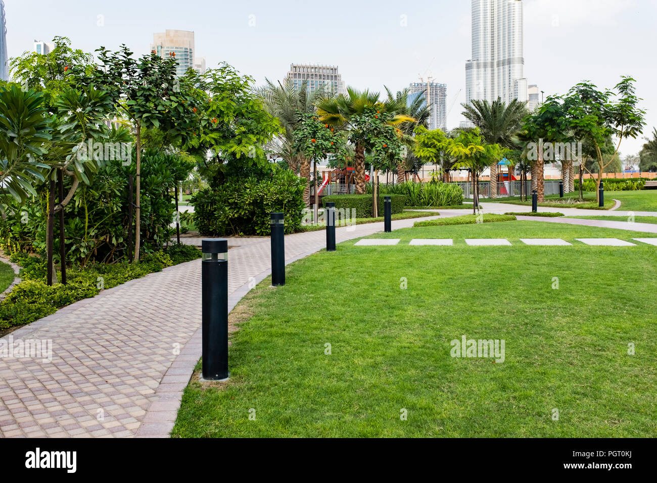 Bay Avenue Park and playground at Business Bay, Dubai, UAE, with the ...