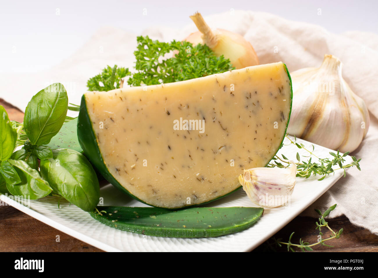 Dutch specialty hard cheese made from cows milk with different spices ...