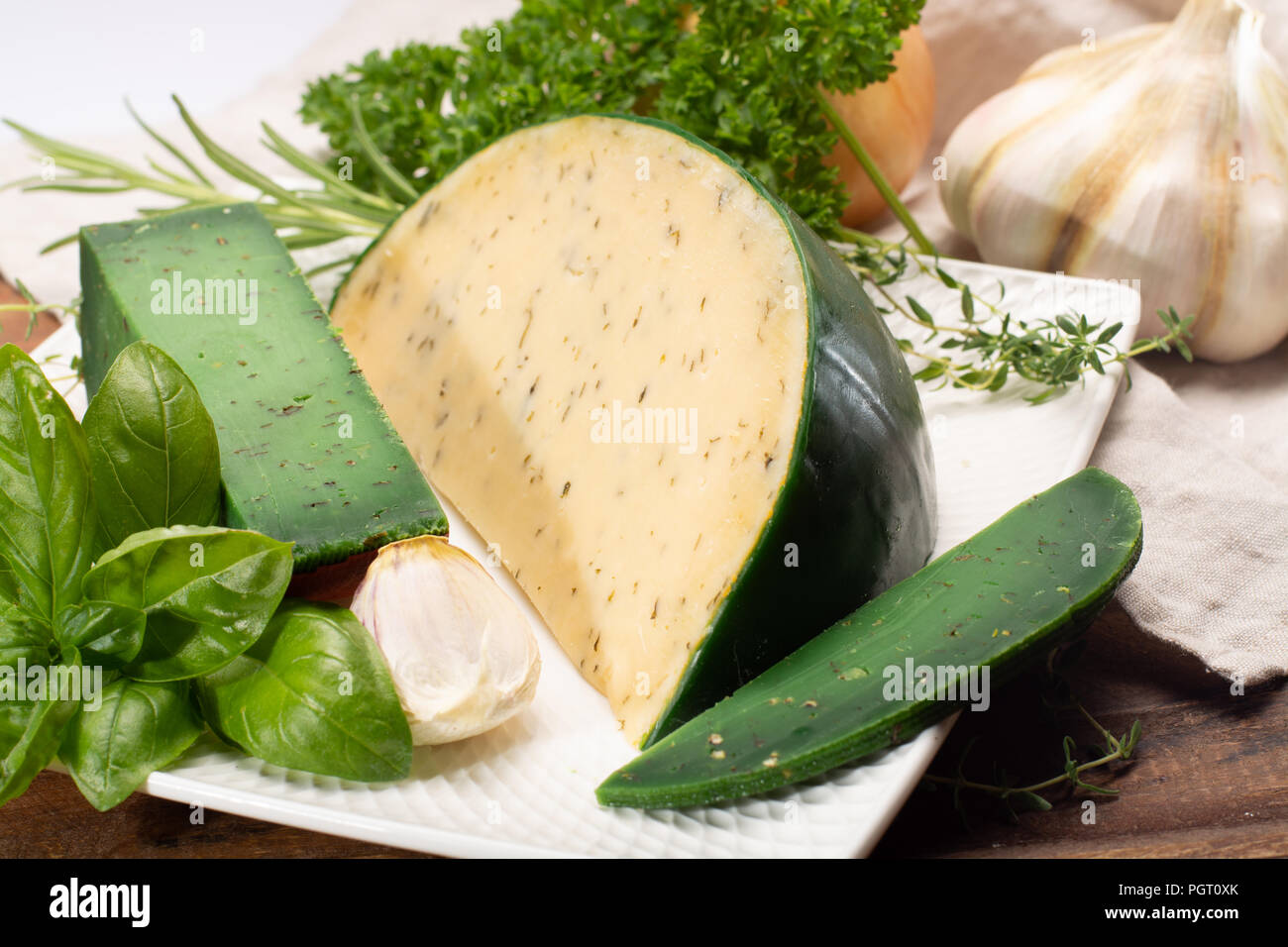 Dutch specialty hard cheese made from cows milk with different spices ...