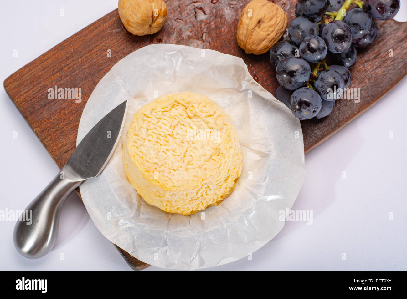 French Langres soft cows crumbly cheese with washed rind structure made ...