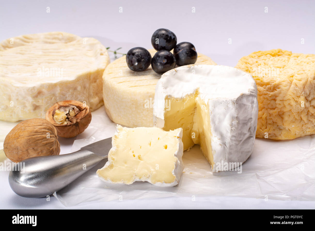 French AOC soft cow cheeses, crumbly Langres with washed rind structure ...