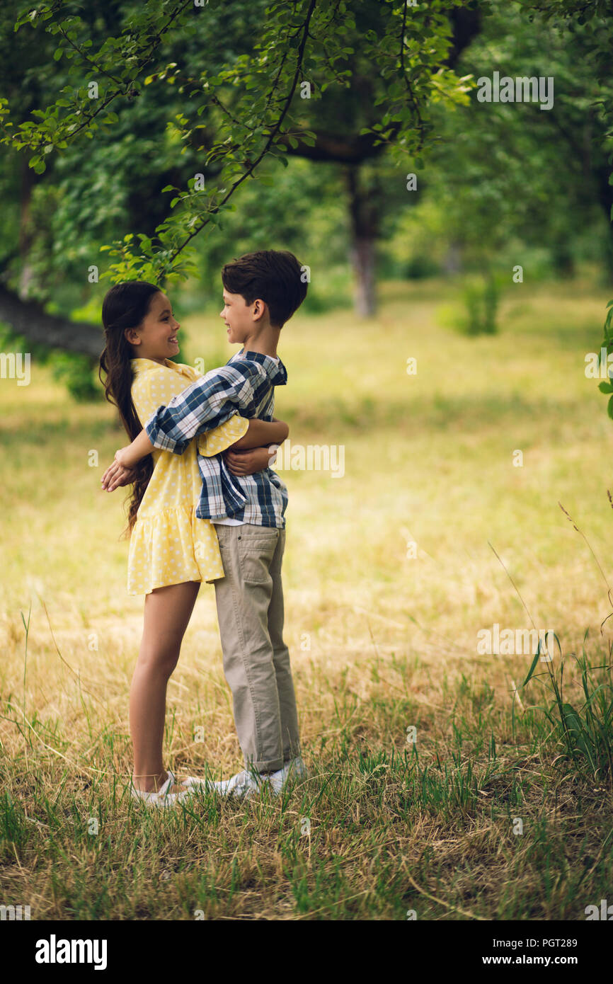 Little kids hugging Stock Photo - Alamy