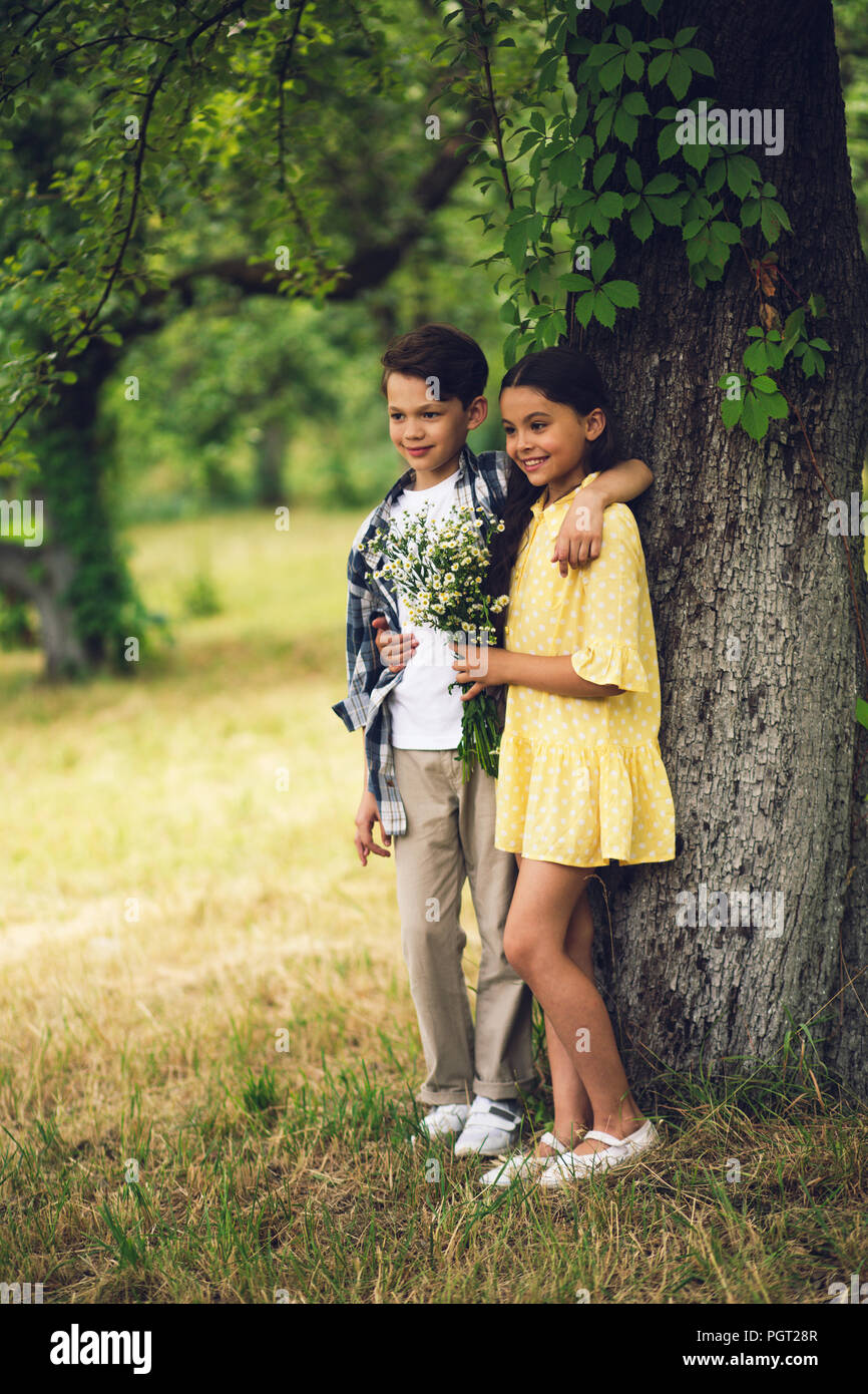 Boy giving flower girl hi-res stock photography and images - Alamy