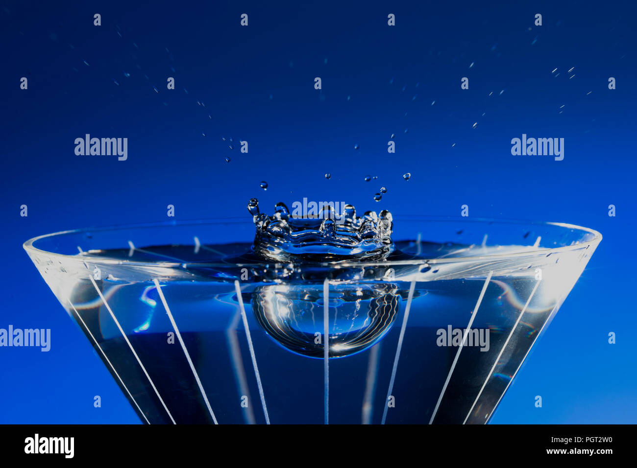 Blue water drop falling down hi-res stock photography and images - Alamy