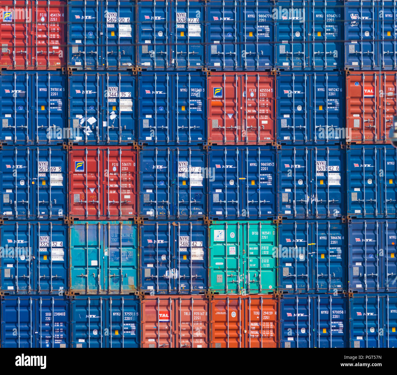 piled up cargo containers in the Rotterdam harbor area Stock Photo - Alamy