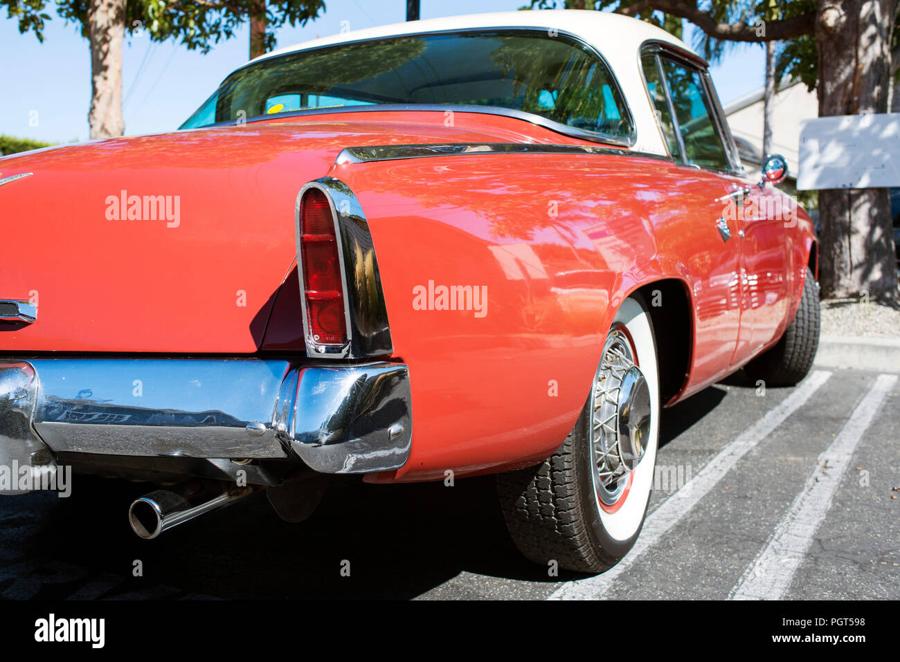 A view of a rare classic vintage American car in a parking lot Stock ...