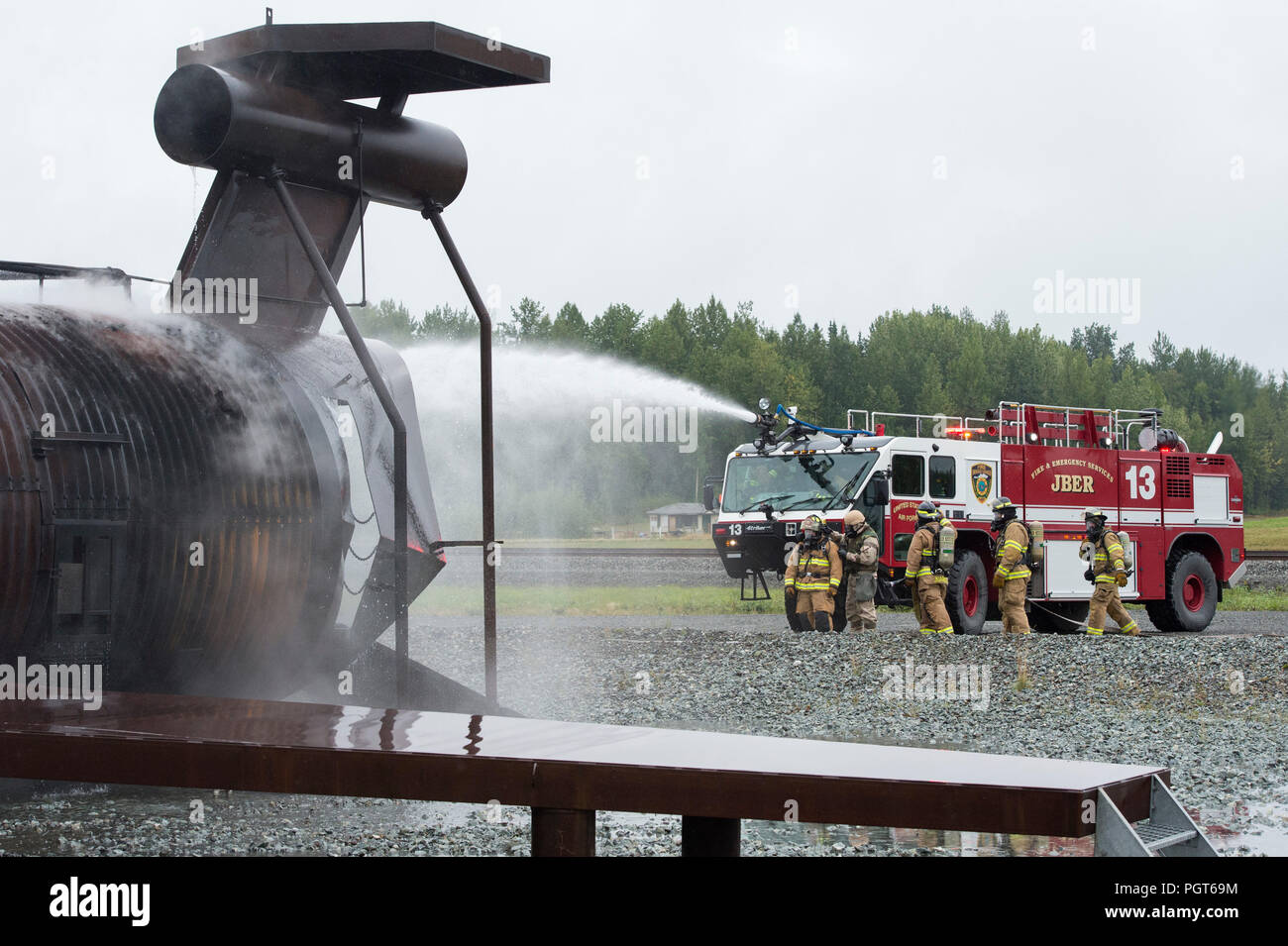 U.S. Air Force fire protection specialists assigned to the 673d Civil ...