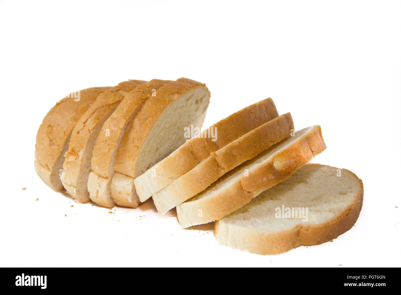 Baton in sliced on a white background. Baking from flour. White bread ...