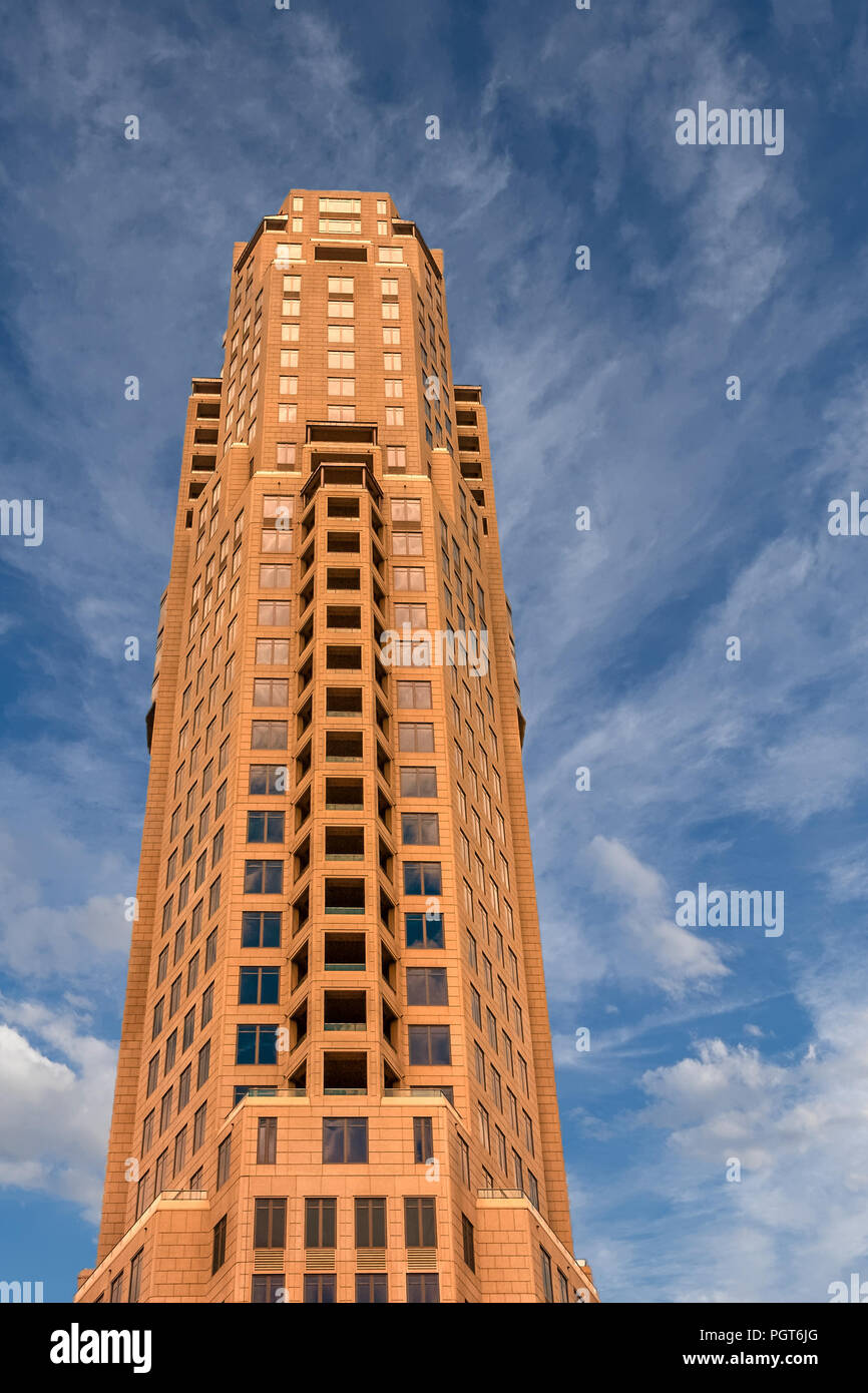 Modern Concrete Office Tower Rising Into Clouds Stock Photo - Alamy