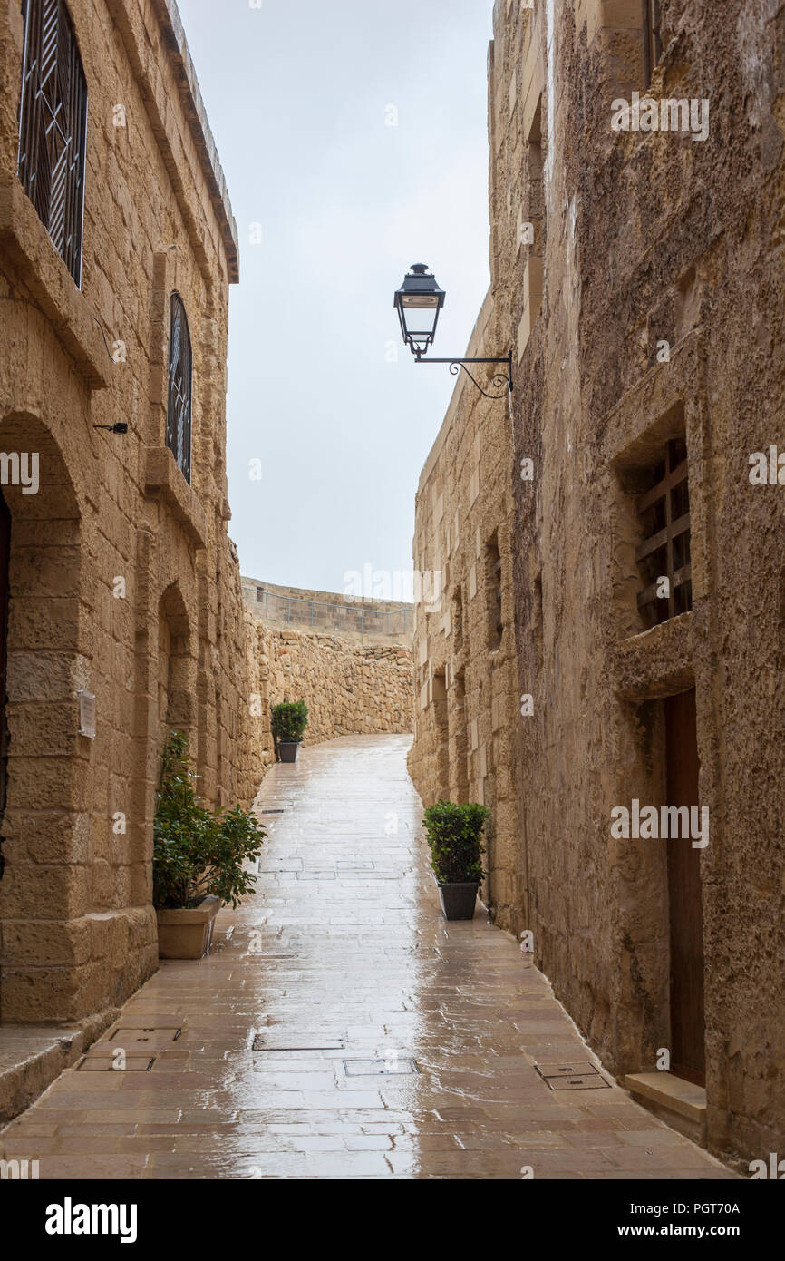Street after the rain in Cittadella on Gozo, Malta Stock Photo - Alamy