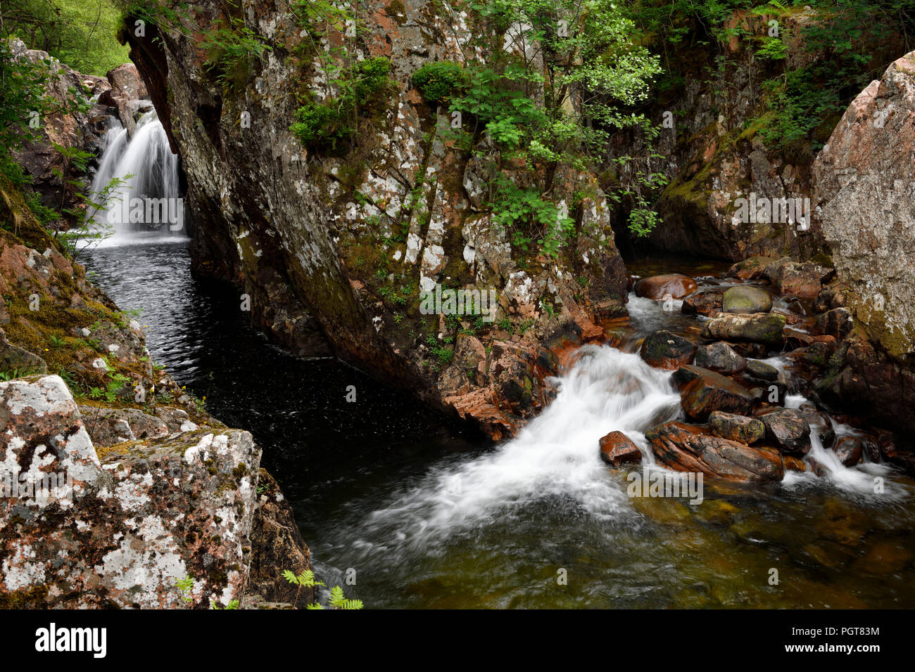 Lower Falls and rapids of the Water of Nevis river in Glen Nevis valley ...