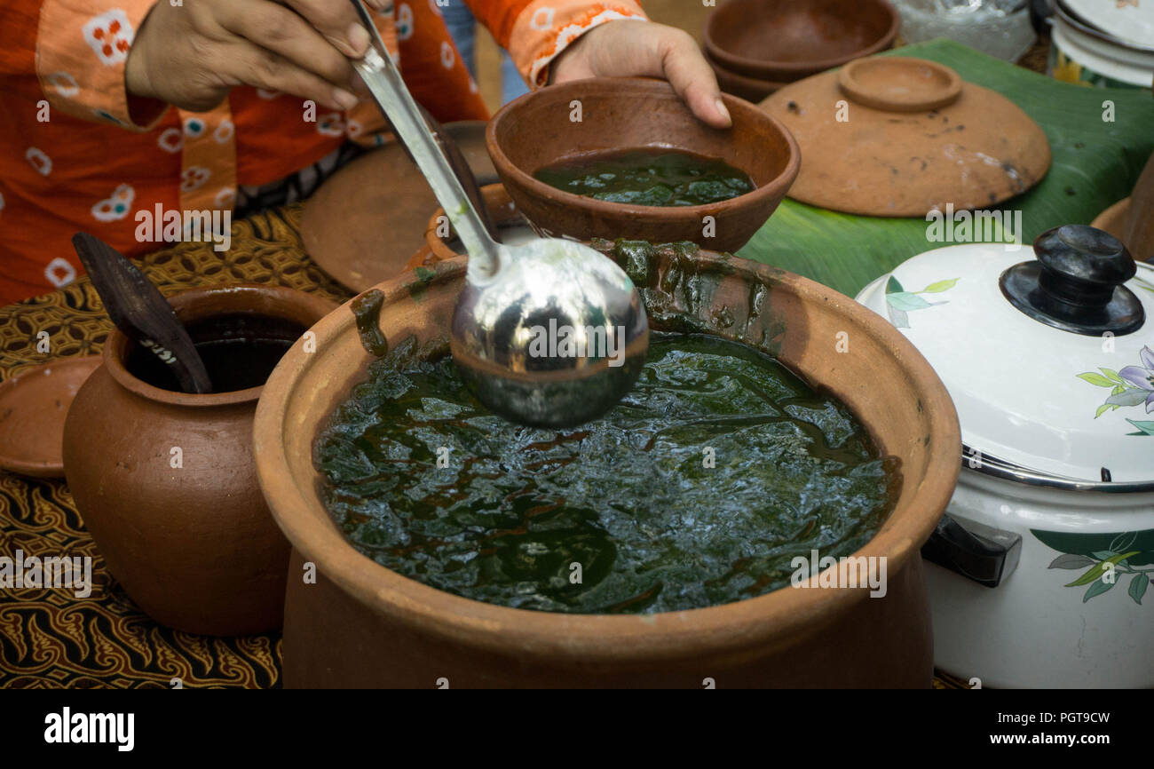 Closeup Grass Jelly green cincau on traditional pottery served in ...