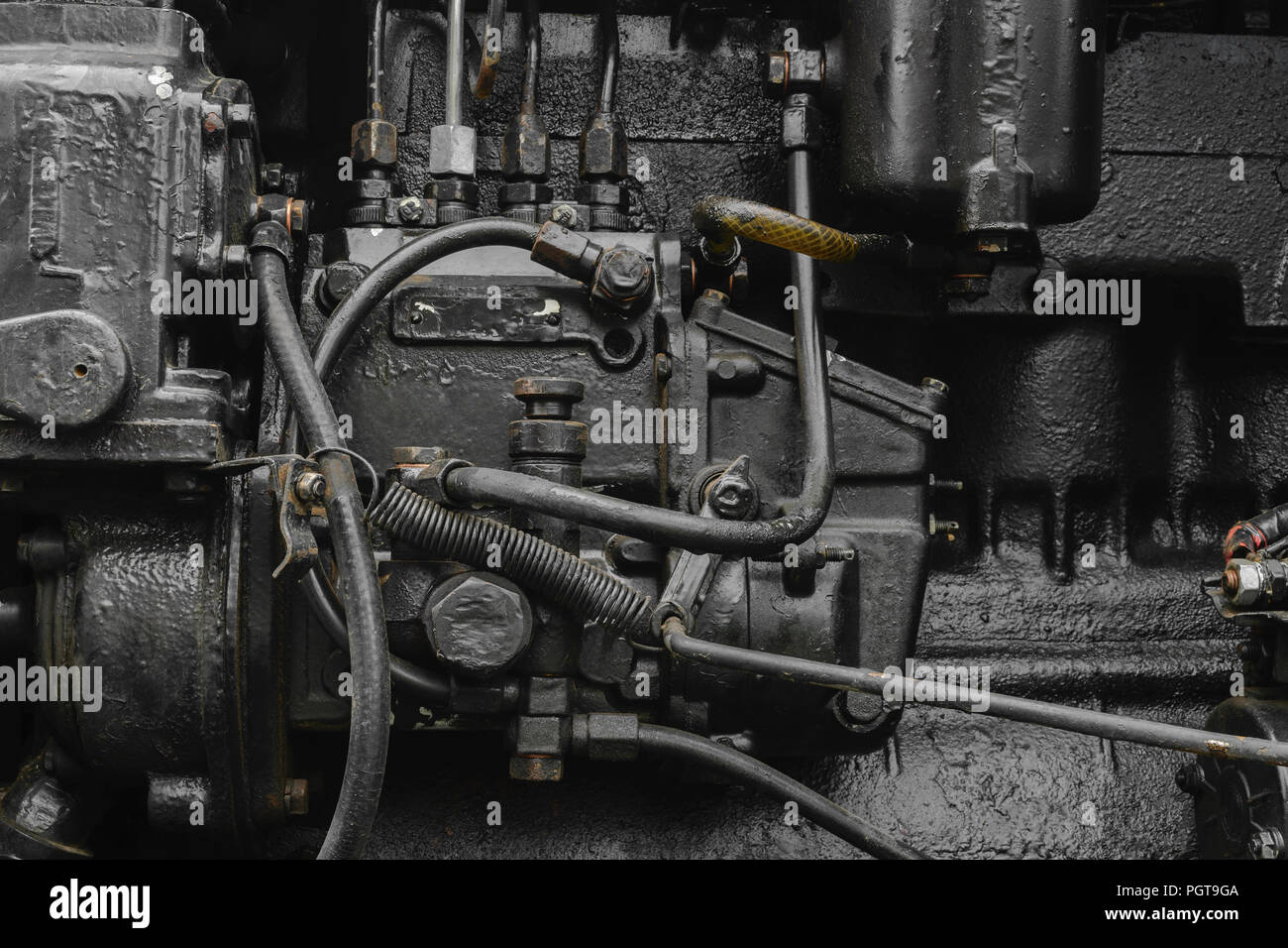 Background surface of old, black and oily machine engine Stock Photo ...