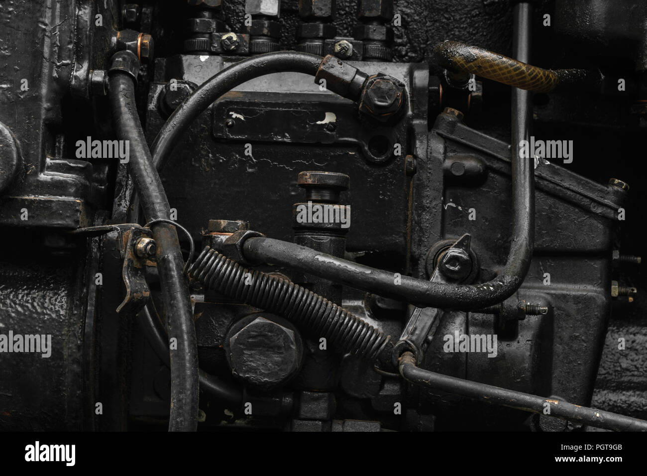Background surface of old, black and oily machine engine Stock Photo ...