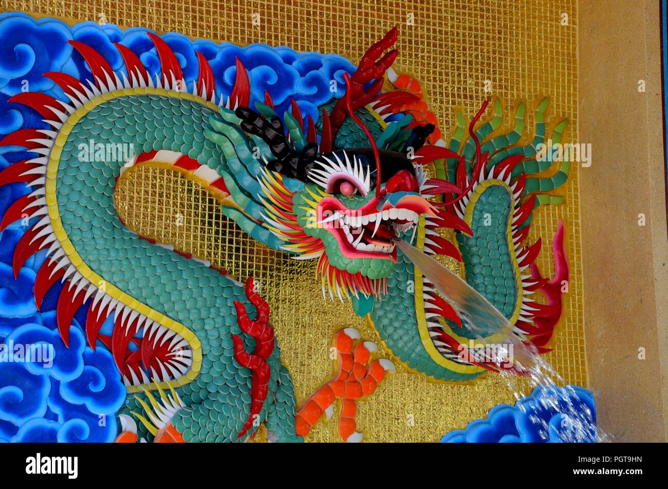 Chinese dragon mosaic sculpture fountain in temple courtyard Pattani ... Chinese dragon mosaic sculpture fountain in temple courtyard Pattani ...