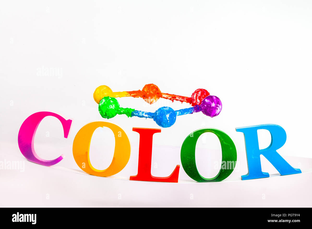 colorful character of the word color in white background with copy ...