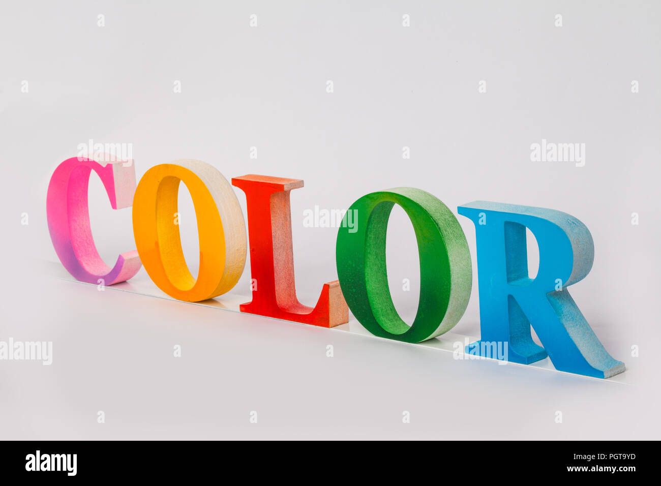 colorful character of the word color in white background with copy ...