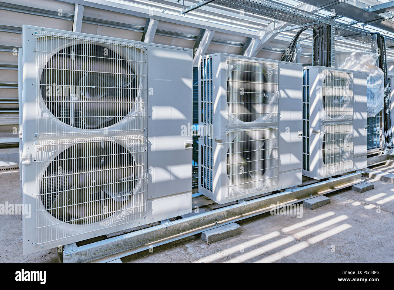 Air conditioning system assembled and installed on top of the building ...