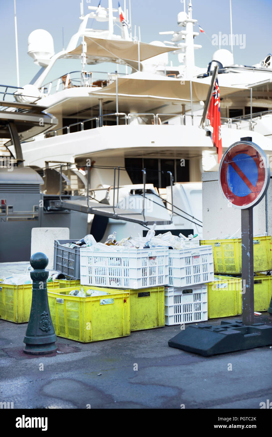 empty bottles by the yachts in St Tropez port Stock Photo - Alamy