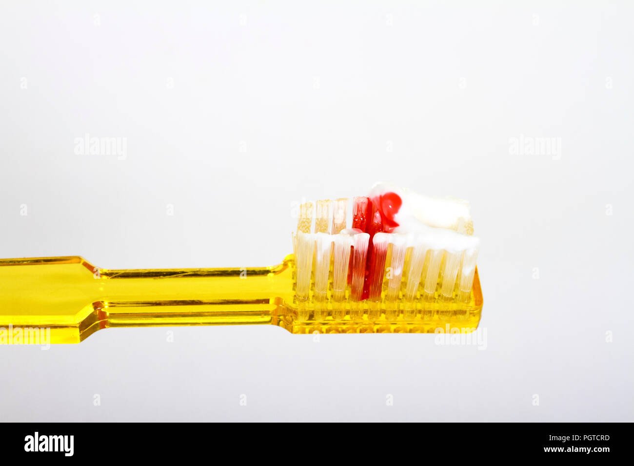Conceptual image of a toothbrush with fake blood on the bristles Stock ...