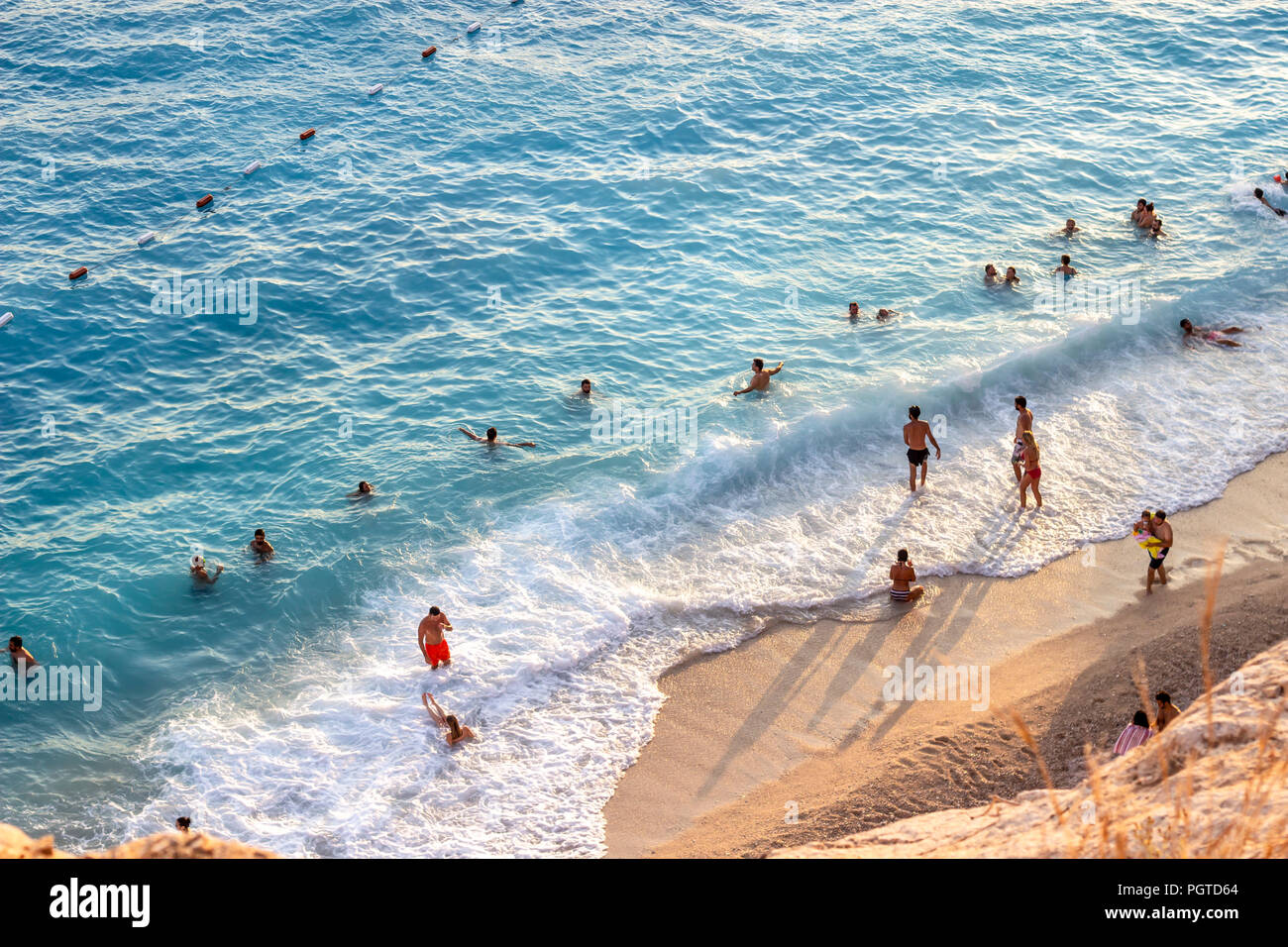 Perspective shoot of coast line picture that people enters the sea ...
