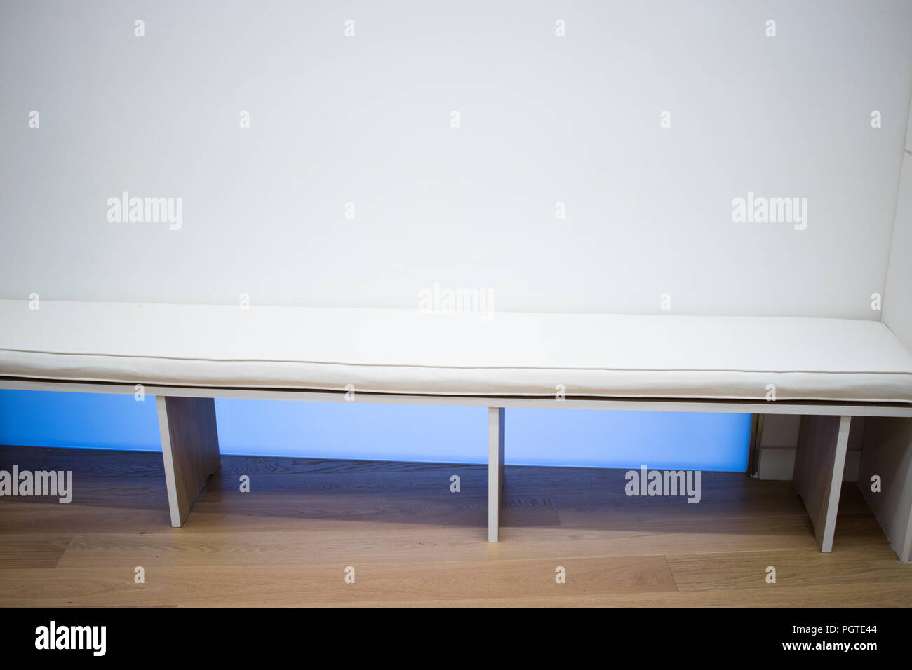 Pilates yoga fitness studio gym room with bench seat waiting and ...