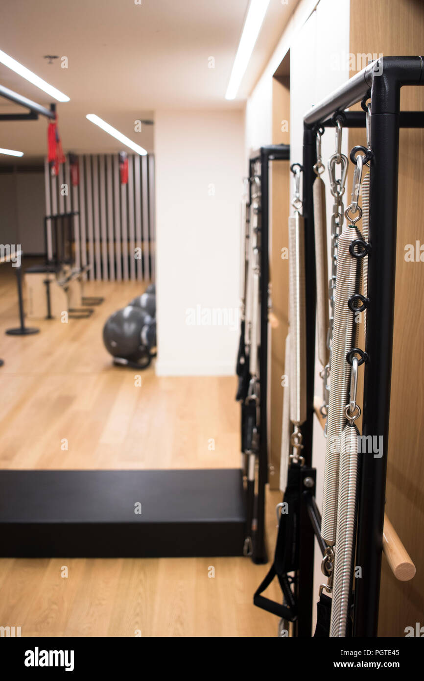 Pilates machine fitness studio gym room with training machines Stock ...