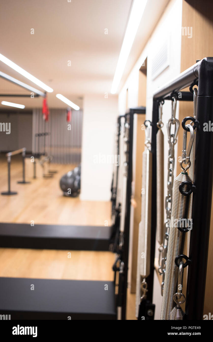 Pilates machine fitness studio gym room with training machines Stock ...
