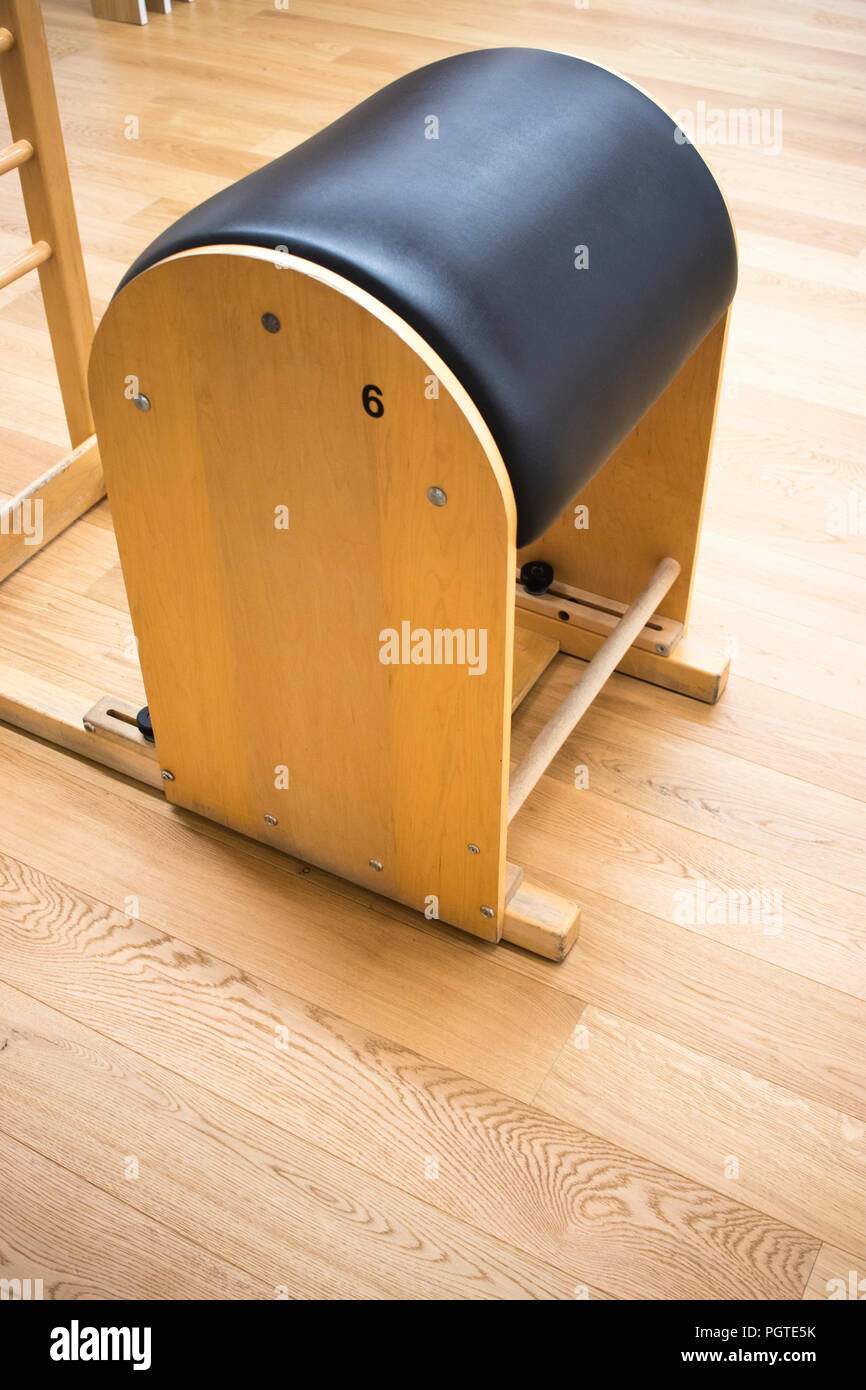 Pilates machine fitness studio gym room with training barrel Stock ...