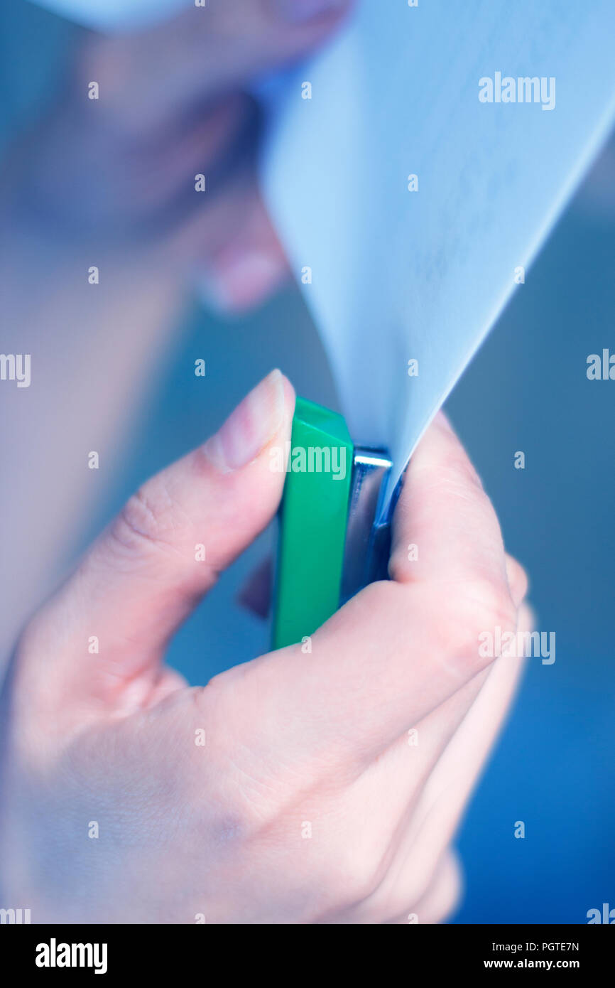 Staple gun woman hi-res stock photography and images - Alamy