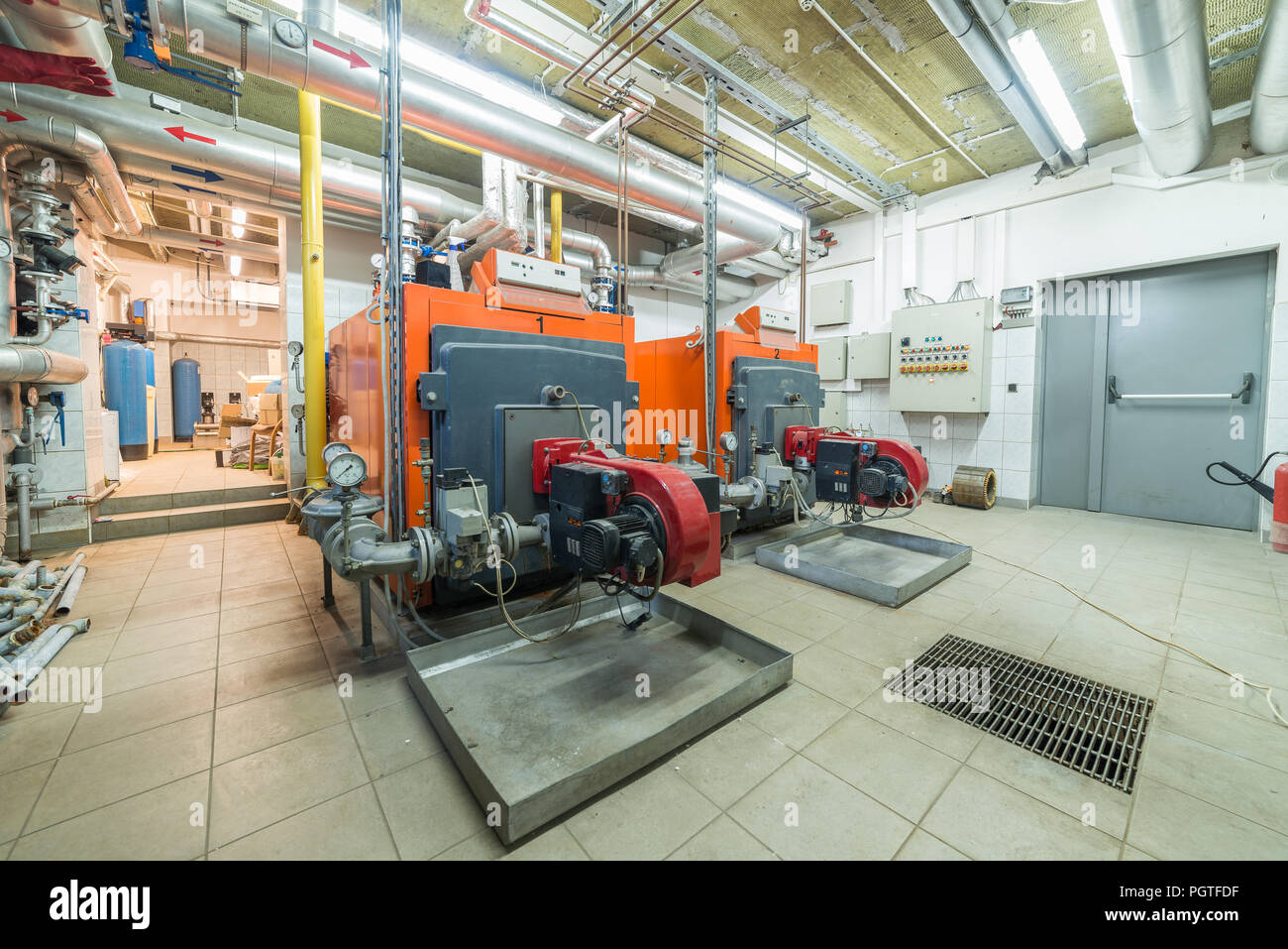 two huge furnaces in the boiler room Stock Photo - Alamy