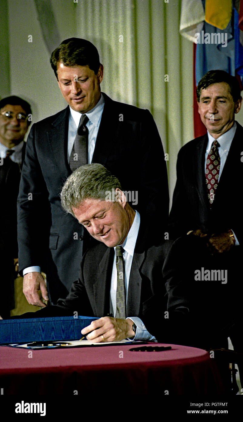 Washington DC., USA, December 8, 1994 President William Clinton signs ...