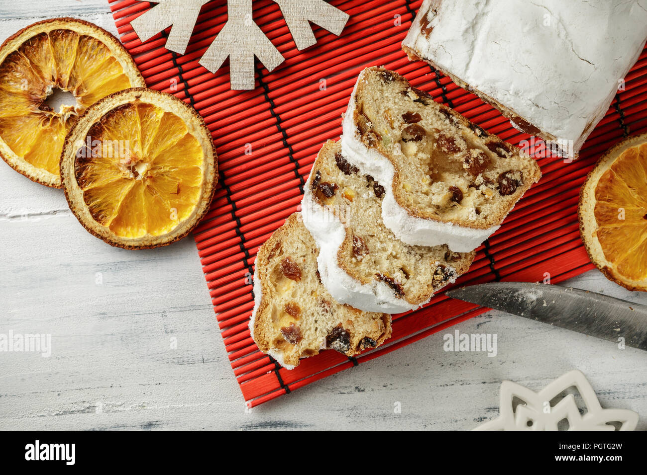 Stollen, traditional German Christmas yeast cake with raisins on the ...