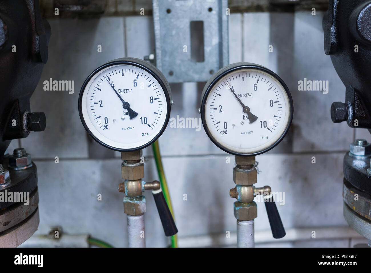 two water pressure gauge. technical room Stock Photo - Alamy