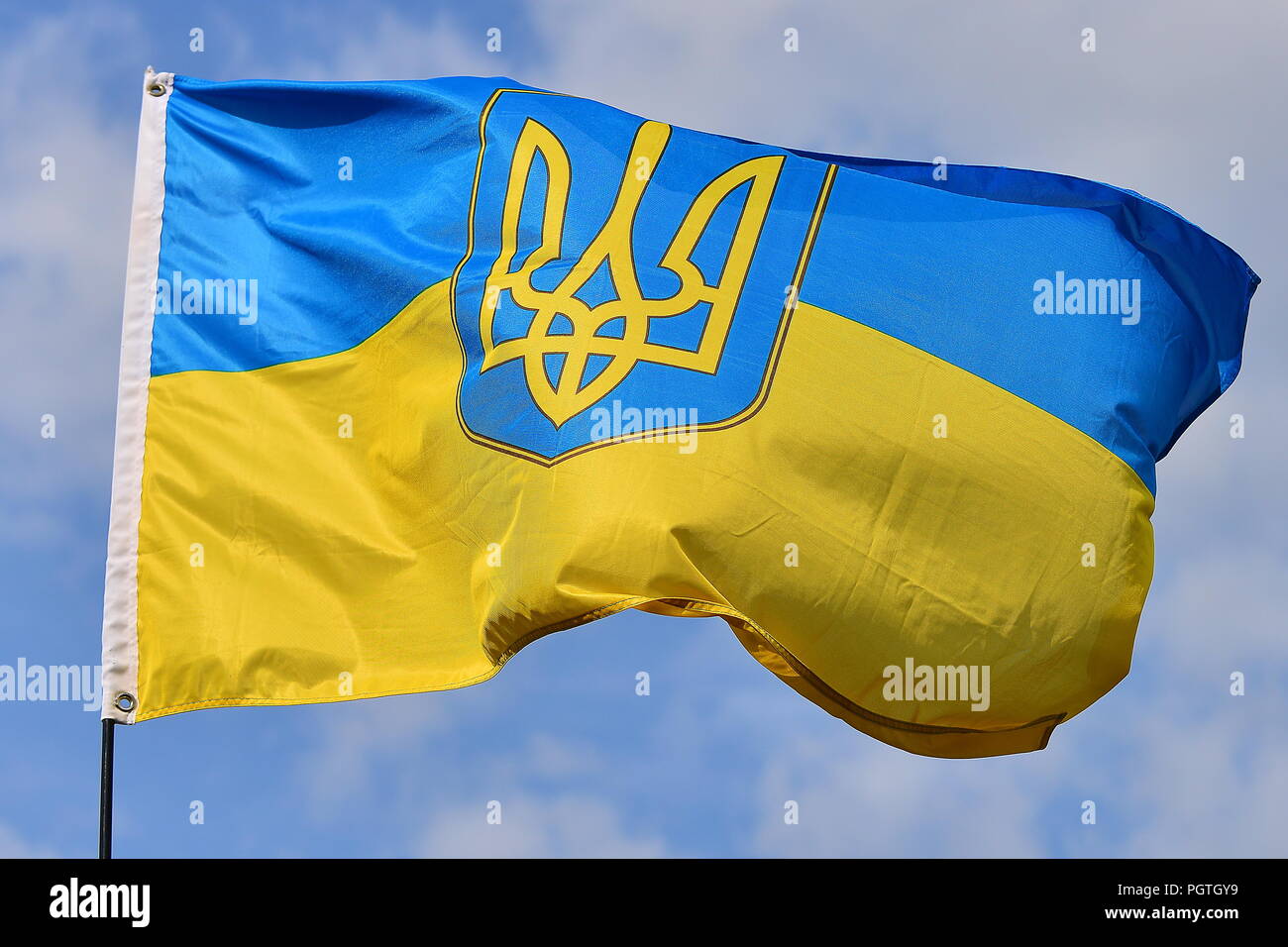 The Ukrainian flag with the state coat of arms of Ukraine, on August 26 ...
