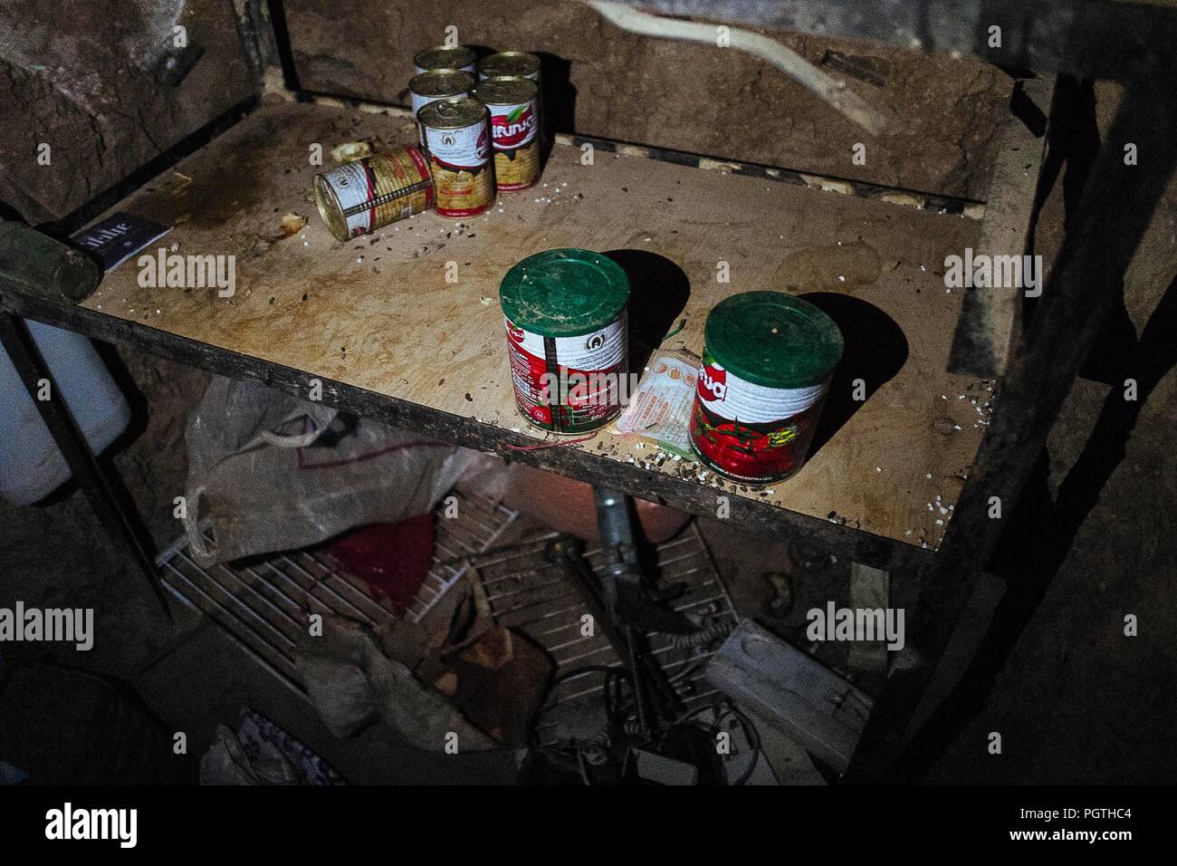 Food cans inside a subterranean hiding place of ISIS in Qaraqosh the ...