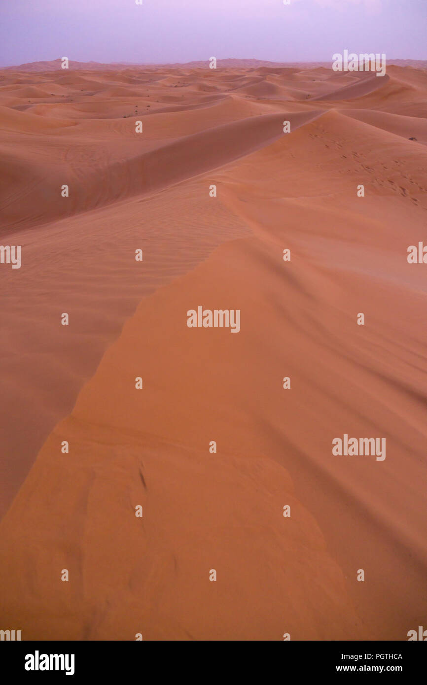 Dubai Desert Al Mada at sunset Stock Photo - Alamy