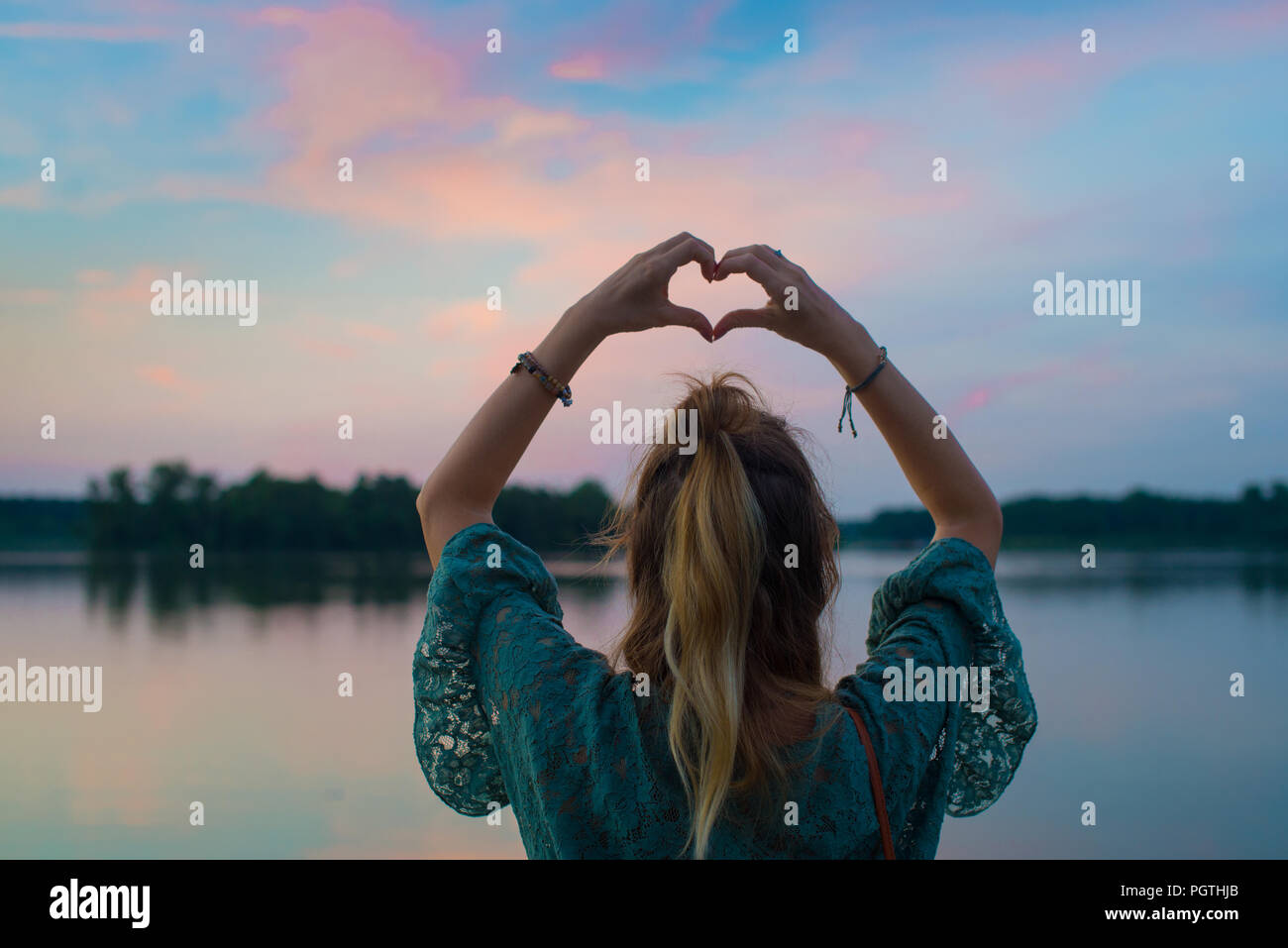 Teen standing with a heart hi-res stock photography and images - Alamy